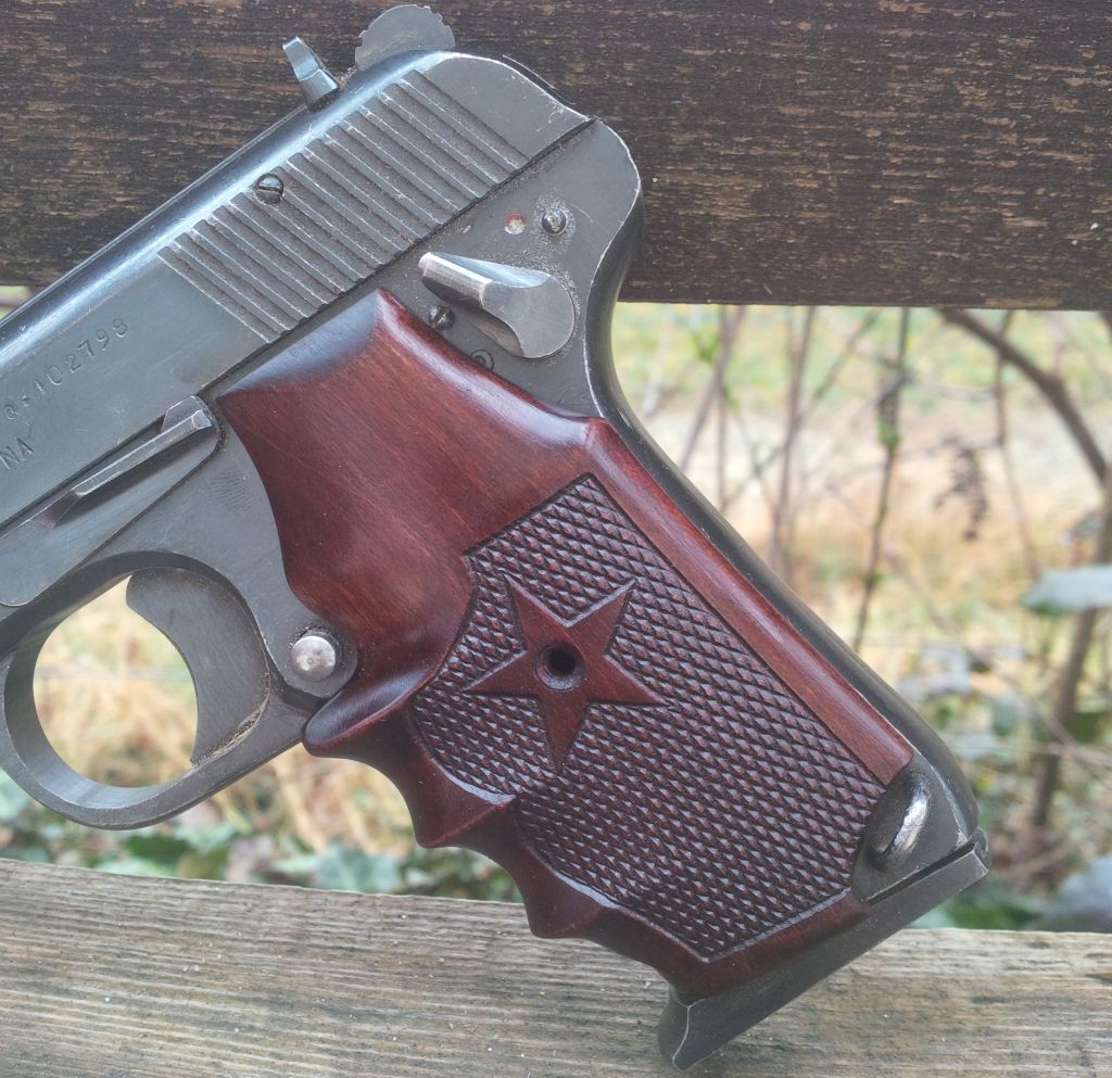NORINCO 213 front-wrap grips.